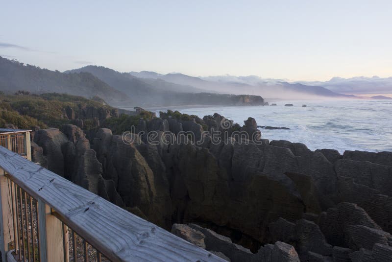 Pancake rocks at sunset stock photo. Image of ocean, punakaiki - 22421632