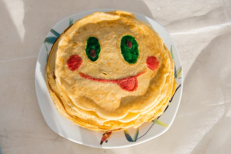 The pancake is smiling. stock image. Image of meal, cooked - 243719545