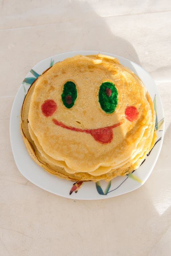 The pancake is smiling. stock image. Image of isolated - 243719573