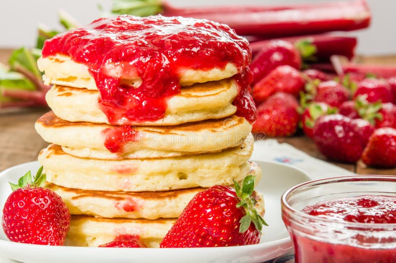 Pancake Stack on Plate with Strawberries Stock Image - Image of ...