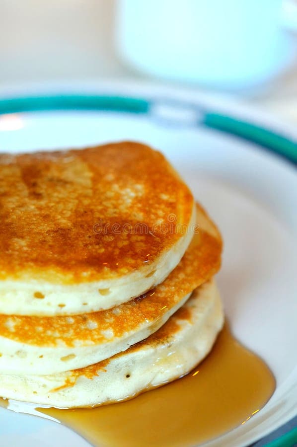 Pancake Stack on White Plate Stock Photo - Image of liquid, honey: 18721484