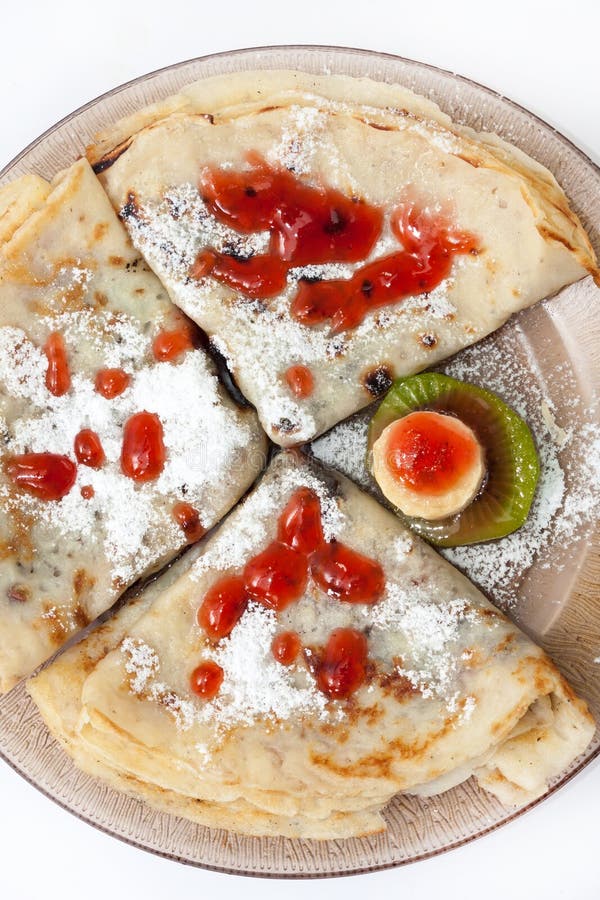 Pancake Triangles with Strawberry Syrup and Kiwi Stock Image - Image of ...