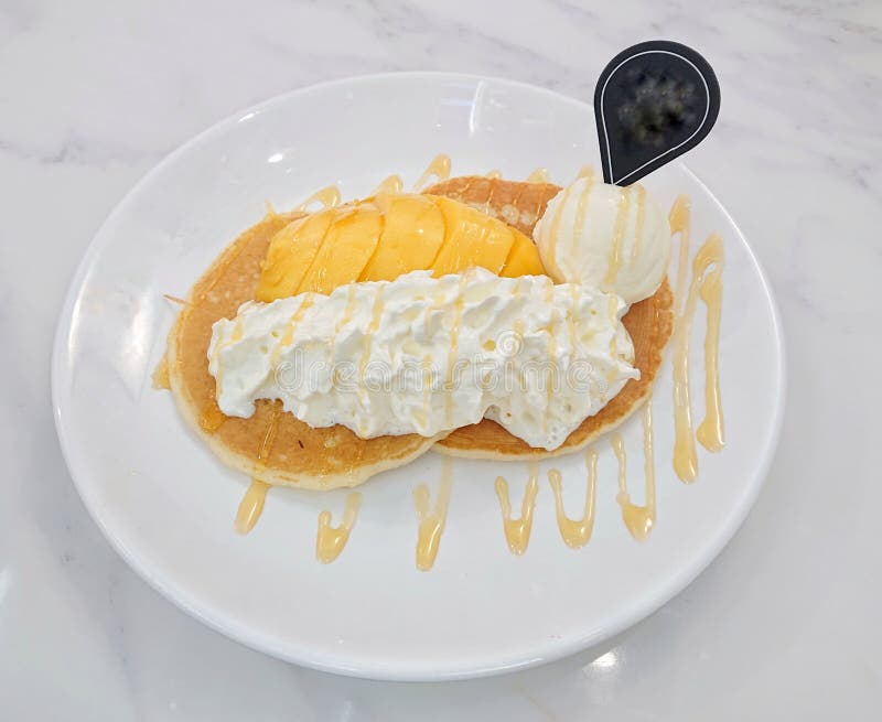 Pancake with Ice Cream and Mango Slices Stock Image - Image of hongkong ...