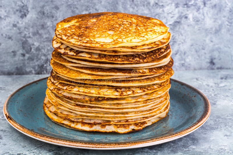 Pancakes on blue plate stock image. Image of delicious - 153093739