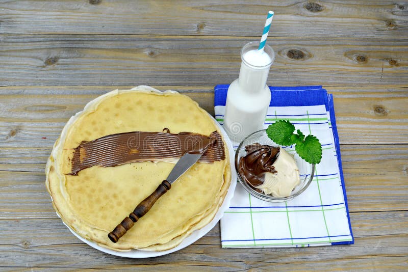 Pancakes, Chocolate Spread and Milk Stock Photo - Image of brown, lunch ...
