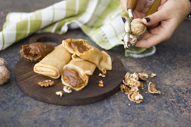Pancakes with Condensed Milk Boiled Stock Image - Image of hands ...