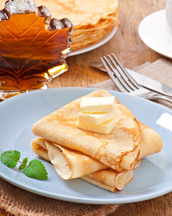 Pancakes with maple syrup stock image. Image of motion - 38115451