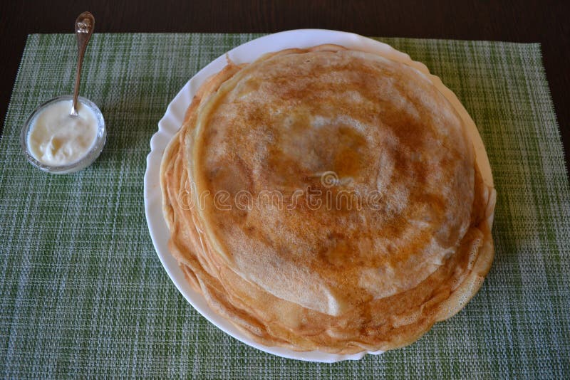 Pancakes on a Plate and Sour Cream in a Socket Stock Image - Image of ...