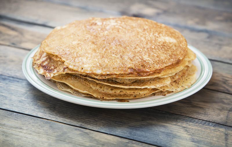 Pancakes in plate on table stock photo. Image of appetizer - 75774184