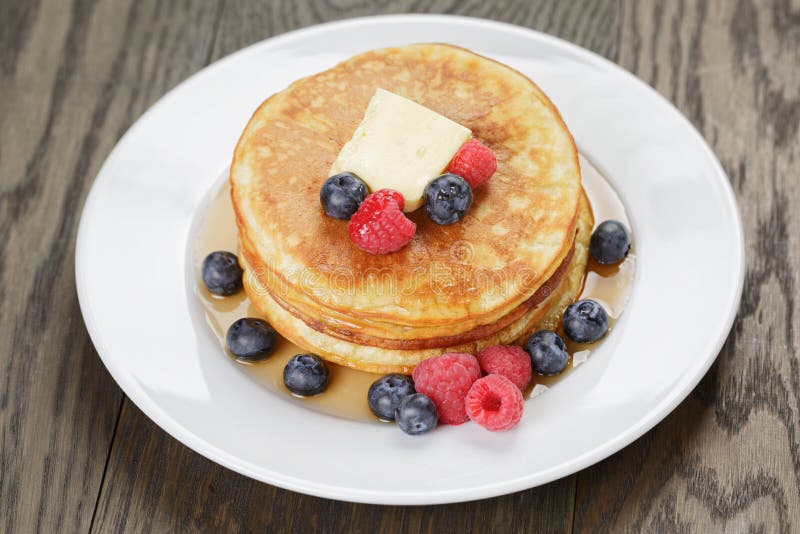 Pancakes with Raspberry, Blueberry and Maple Syrup Stock Photo - Image ...