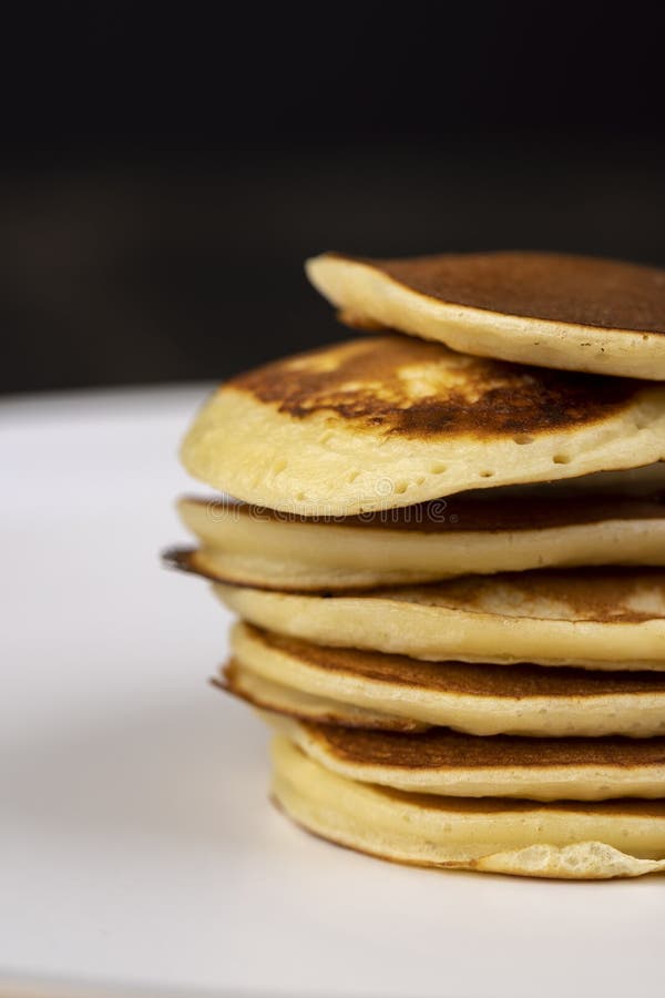 Pancakes Stacked Together on a Bowl, a Tower of Small Milk Stock Photo ...