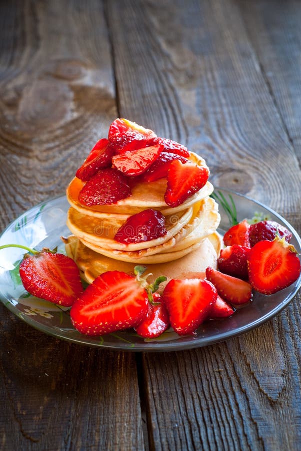 Pancakes with strawberries stock photo. Image of appetizing - 55788272