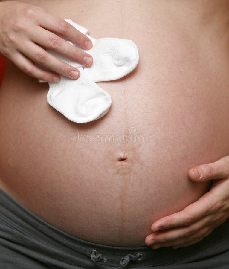 Pancia delle donne incinte fotografia stock. Immagine di grande - 286128