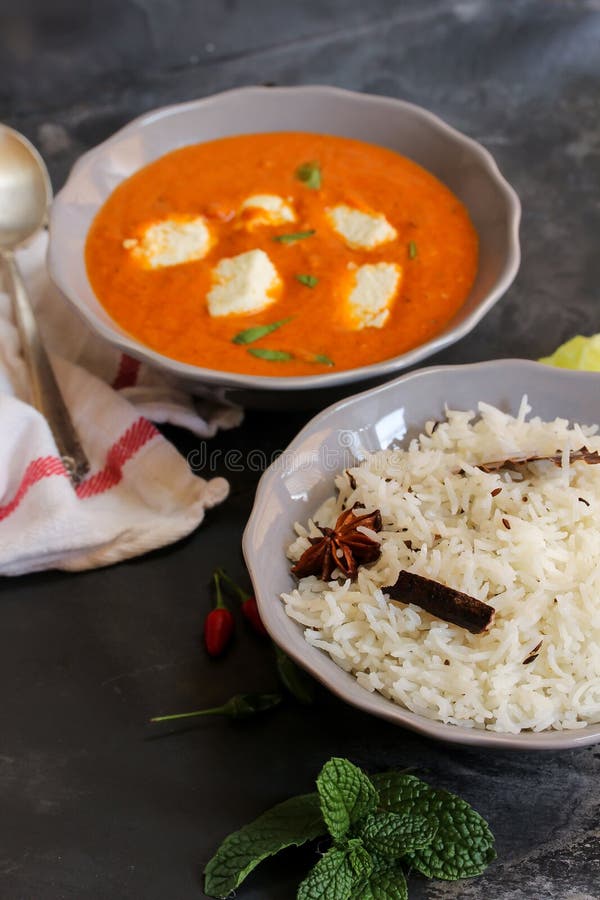 Paneer Butter Masala and Cooked Rice Indian Curry Dinner Stock Photo ...