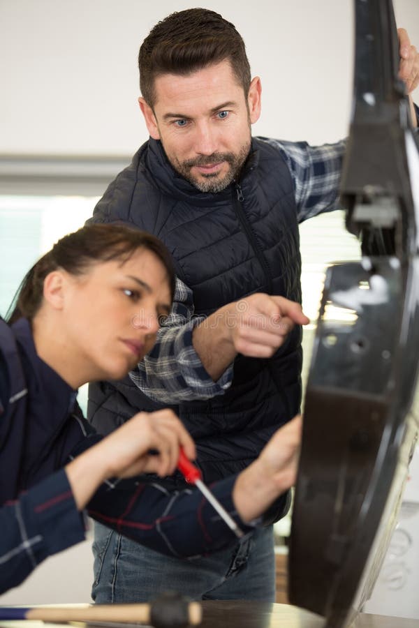 Panel Beating Team in Garage Stock Photo - Image of panel, training ...