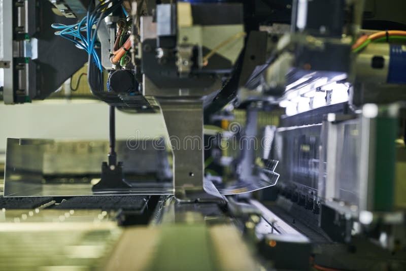 Panel Bending Machine at Work. Process of Metal Sheet Forming Stock ...