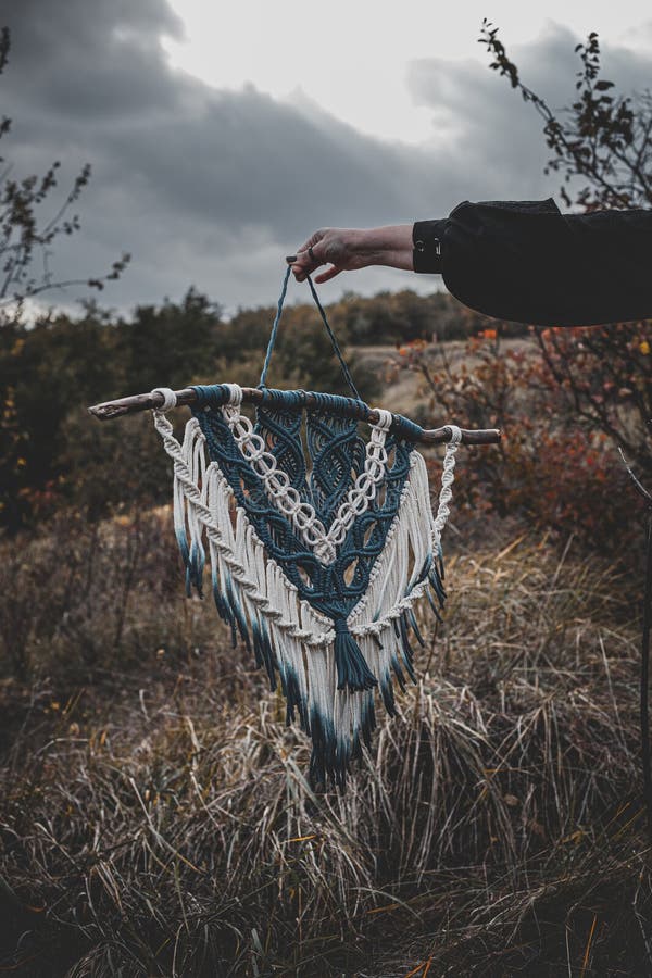 Panel of Blue and White Macrame on a Decorative Branch Stock Photo ...