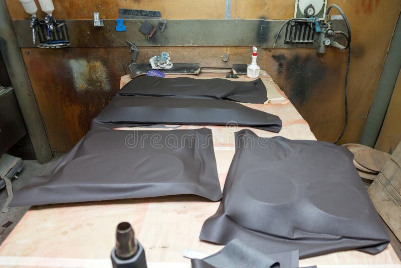 The Panel of the Car Interior on a Workbench in a Workshop for Repair ...