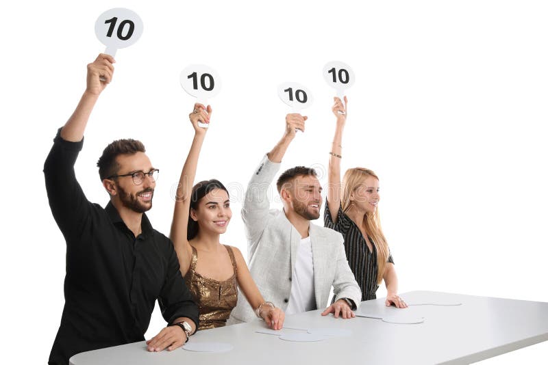 Panel of Judges Holding Signs with Highest Score at Table on White ...