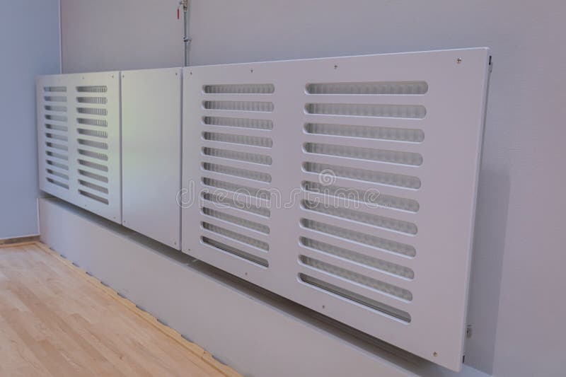 Panel Radiators Encased in a Grille with Longitudinal Openings in the ...