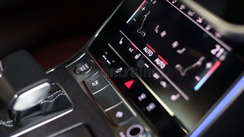 The Panel of Various Buttons a in a Modern Car. LCD Screen of Climate ...