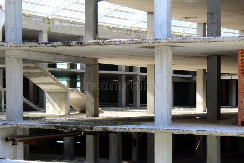 Unfinished Abandoned Building with a Bunch of Construction Waste Stock ...