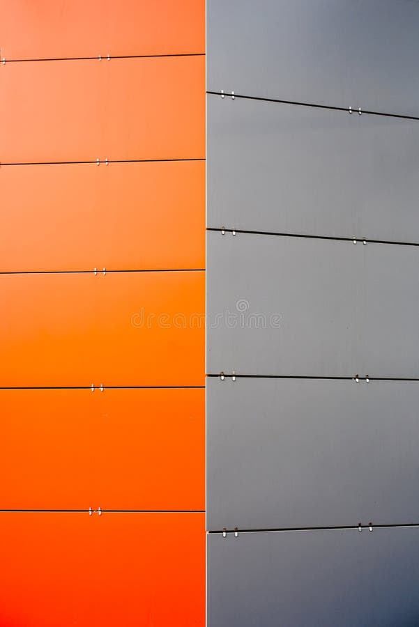 Panels Facing Modern Buildings of Red, Orange and Gray. Geometry and ...