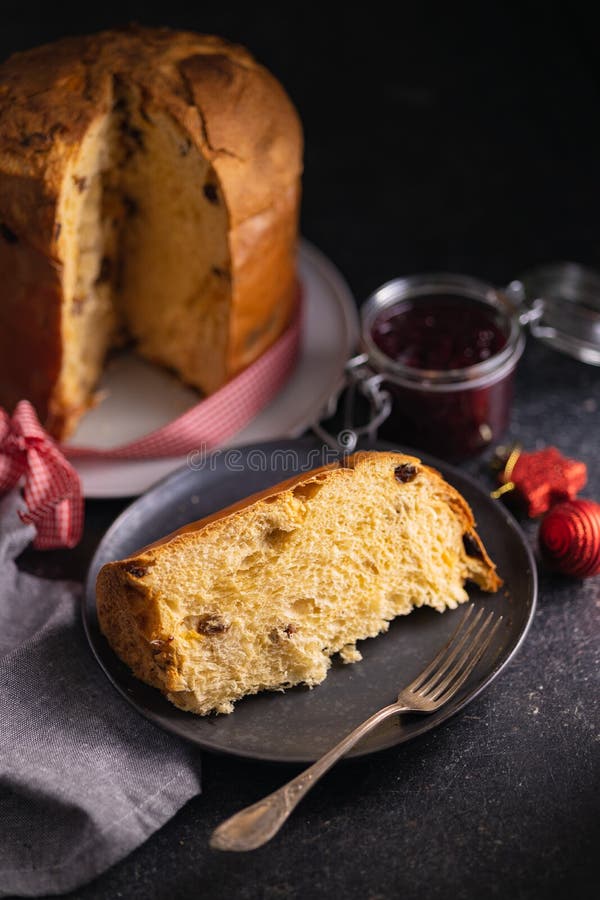 Panettone Christmas Cake. Italian Sweet Bread on Plate on Dark Table ...
