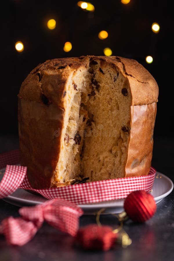 Panettone Christmas Cake. Italian Sweet Bread on Plate on Dark Table ...