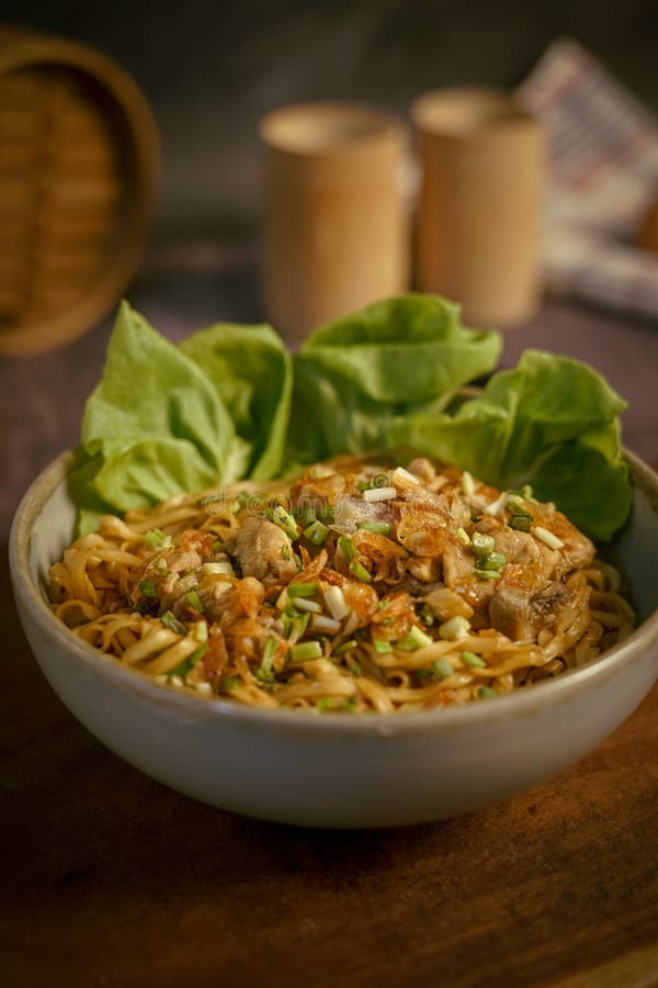 Pangsit Mie or Wheat Noodle with Diced Chicken Meat - Portrait Close ...
