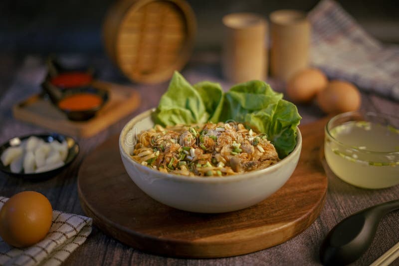 Pangsit Mie or Wheat Noodle with Diced Chicken Meat - Wide Stock Photo ...