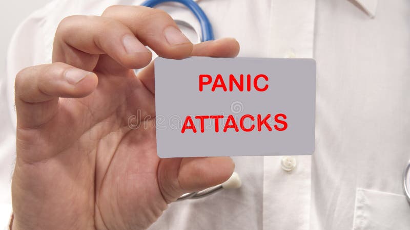 Panic Attacks the Text on the Card of a Man in a White Shirt Stock ...