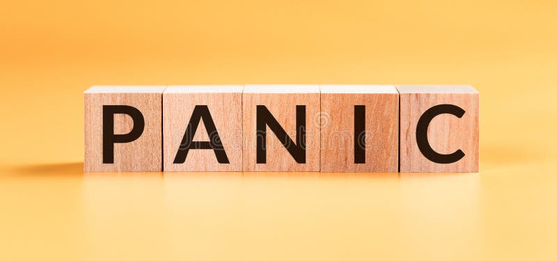 PANIC Word Written on Wooden Cubes on Yellow Background Stock Photo ...