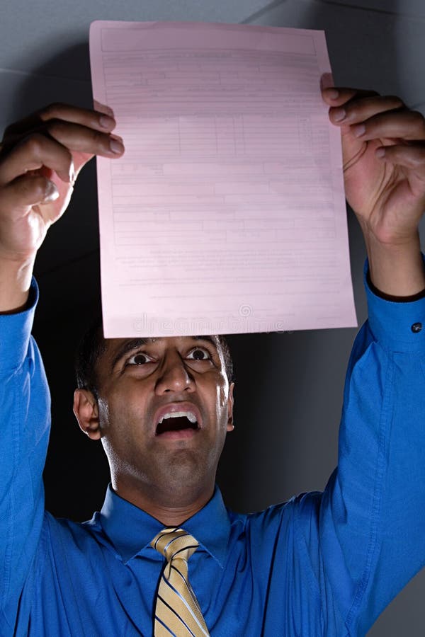 Panicked Man Looking at Form Stock Image - Image of people, arms: 62561267