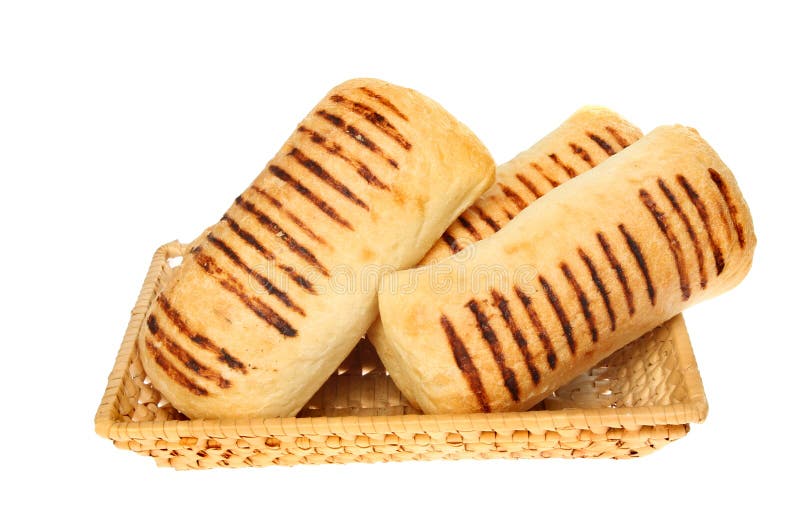 Panini Rolls in Rustic Kitchen Setting with Cooking Utensils Stock ...