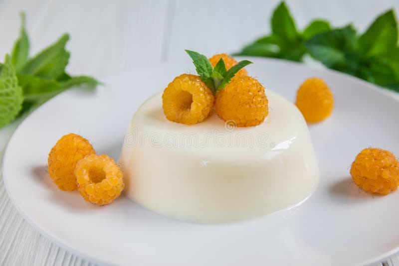 Panna Cotta with Raspberry, Decorated with Fresh Mint. Stock Image ...