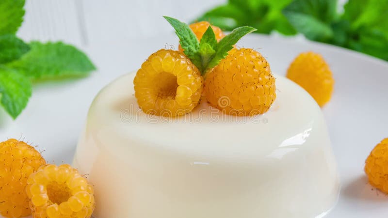 Panna Cotta with Raspberry, Decorated with Fresh Mint. Stock Video ...