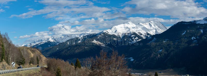 Panorama of Snowy Austrian Alps with Valley and Road Stock Image ...