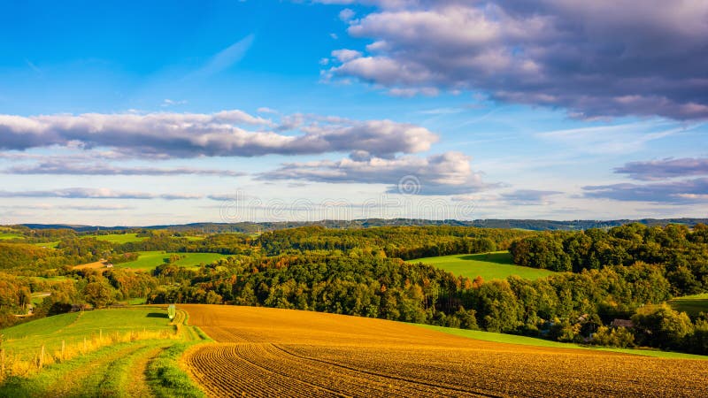 Landscape in Germany with Many Wind Turbines, Green Fields and Bright ...