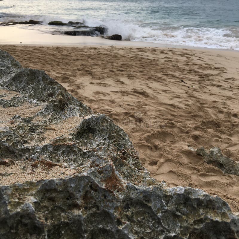 Rock, Sand, and Beach at stock image. Image of footprint - 222445949