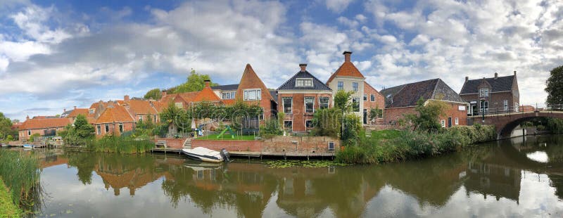 Canal in Winsum, Groningen editorial photo. Image of housing - 186336511