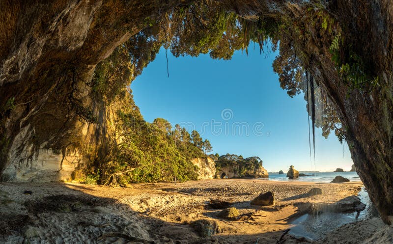 Panorama in Cathedral Cove with Sfinx in the Background Stock Photo ...