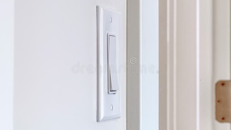 Panorama Crop Side View of Electrical Rocker Light Switch Mounted on ...