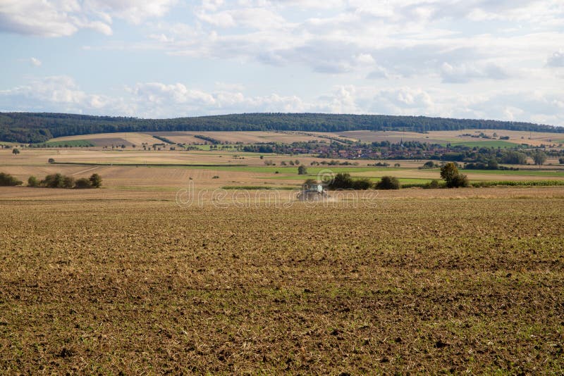 Panorama of a Field with a Tractor, Hilly Landscape Stock Image - Image ...