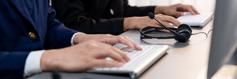 Panorama Focus Headset on Call Center Workspace Desk with Blur Operator ...