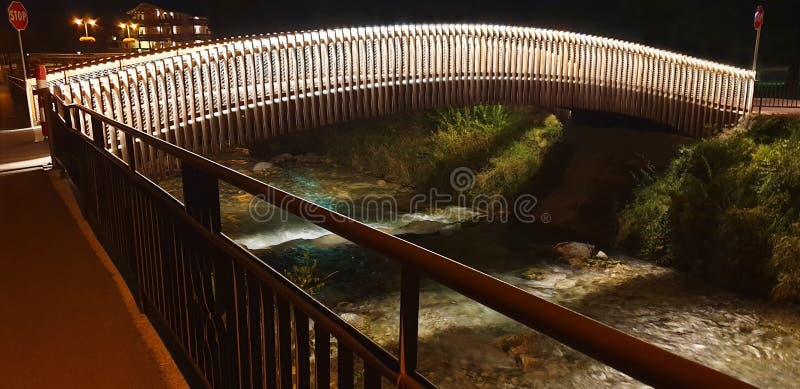 Panorama of the Glowing Bridge at Night Stock Image - Image of glowing ...