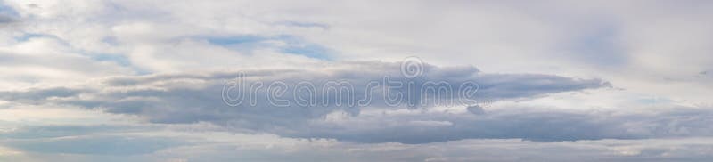 Panorama of the Sky with Dense Gray Clouds at Sunset Stock Photo ...