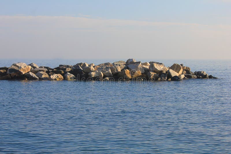 Panorama with Stones and Rocks in the Sea Stock Photo - Image of clouds ...