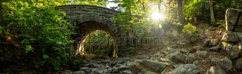 Panorama of Sun Shinging Bright Over Waterfall Bridge in Acadia Stock ...