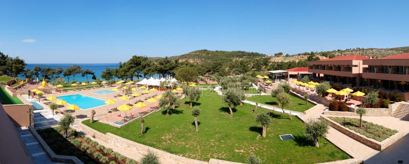 Panorama of Swimming Pools and Bar by a Beach Stock Photo - Image of ...